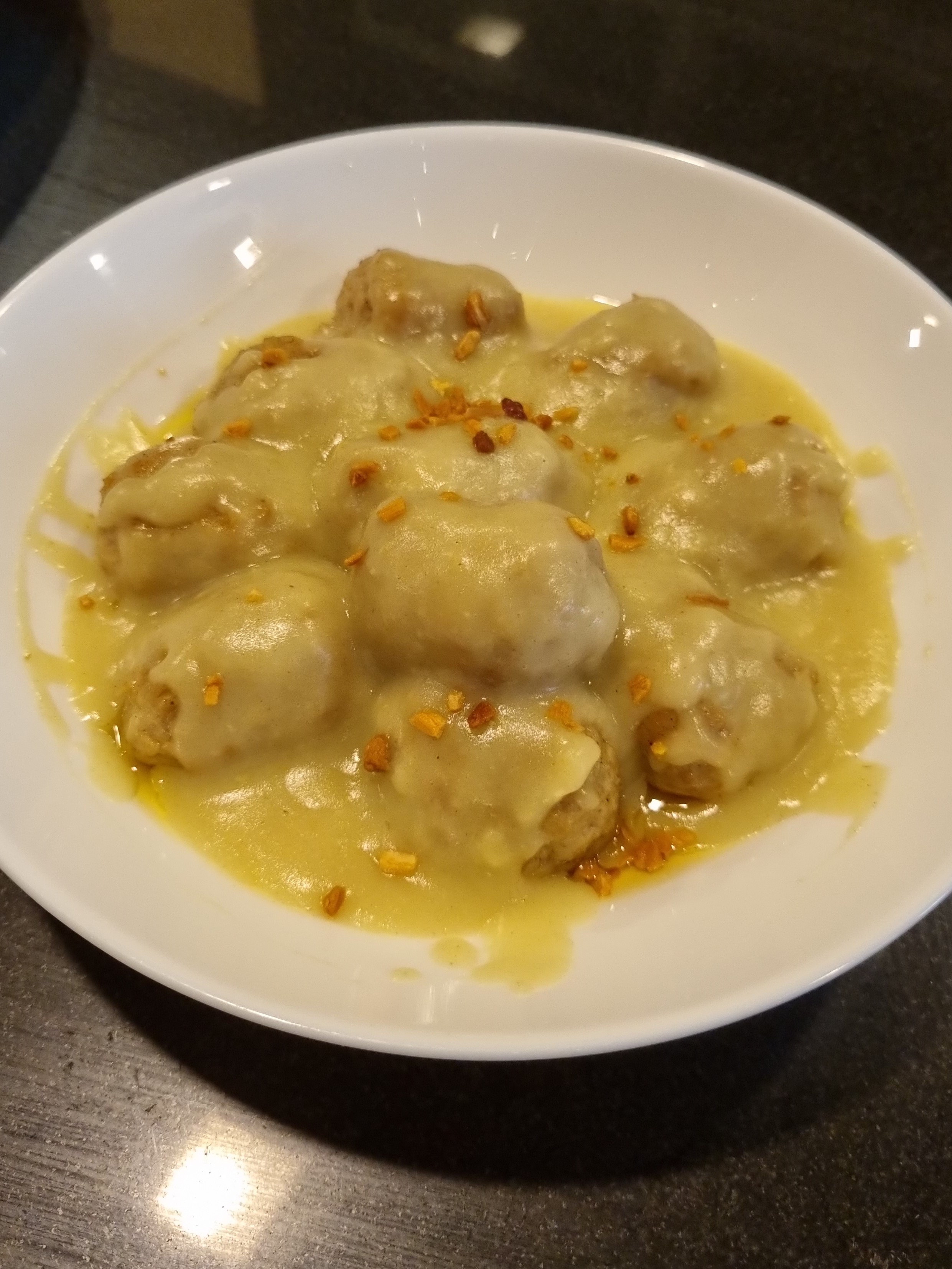 CHICKEN BOLA-BOLA WITH SAUCY MUSHROOM GRAVY