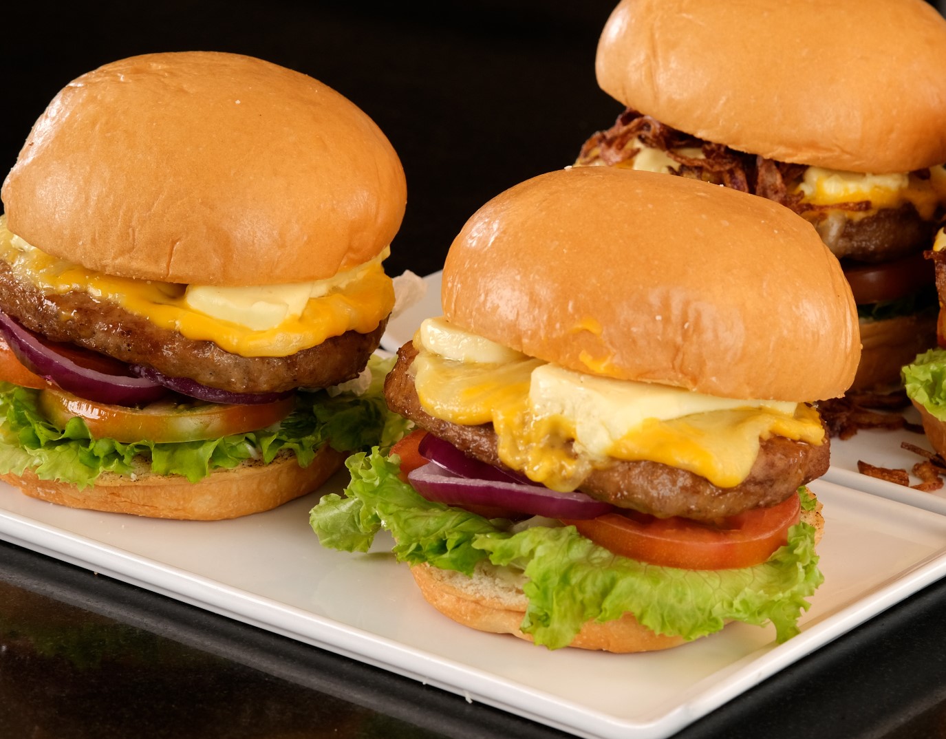 TRIPLE CHEESE ANGUS BURGER