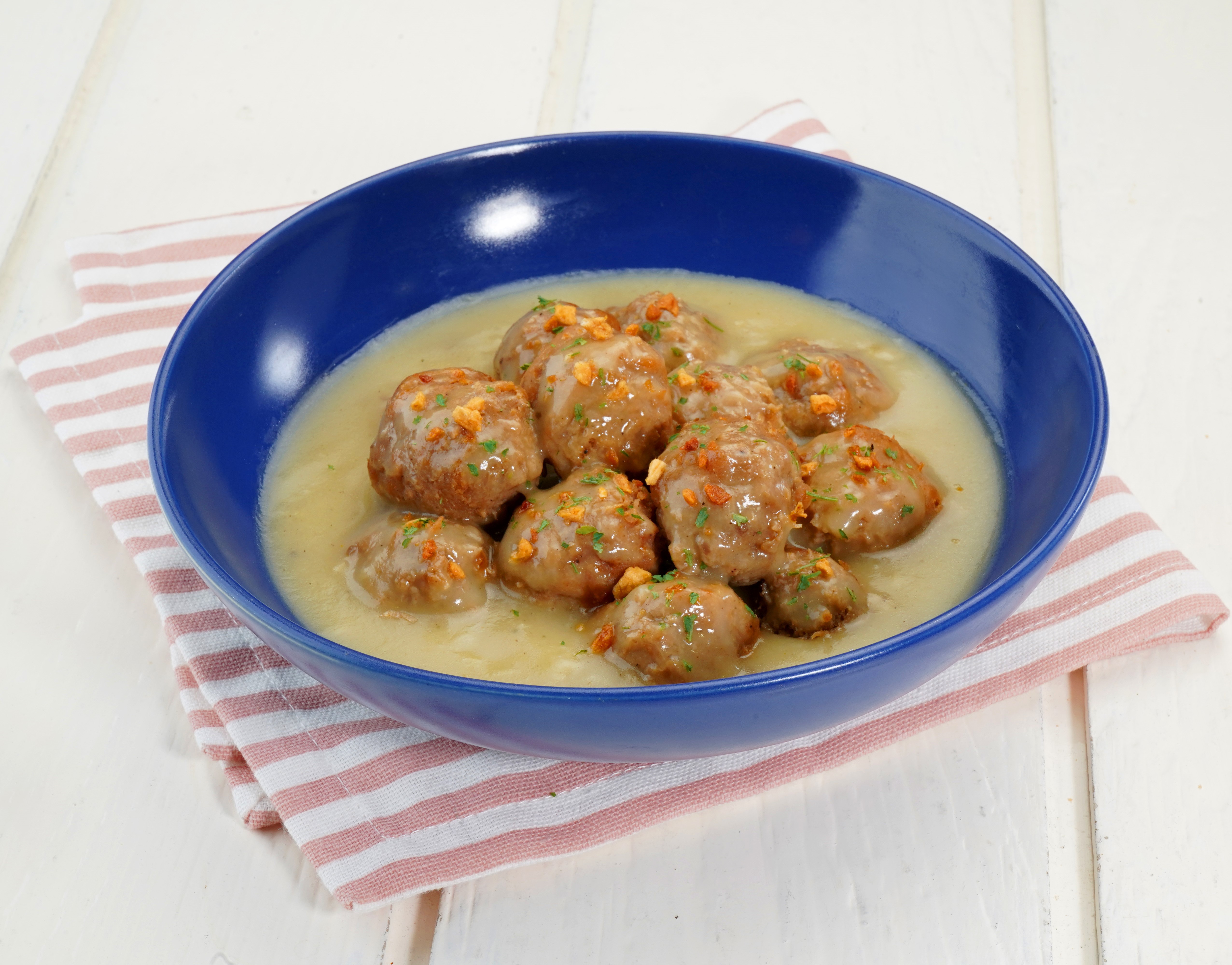 CHICKEN BOLA-BOLA WITH SAUCY MUSHROOM GRAVY